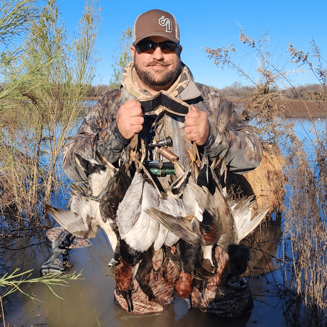 Duck-Tails Guide Service with Captain Experiences